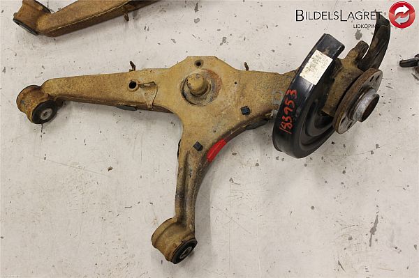 7E0501071 : Asschenkel / Wielnaaf achter en Draagarm achter - Autoparts24